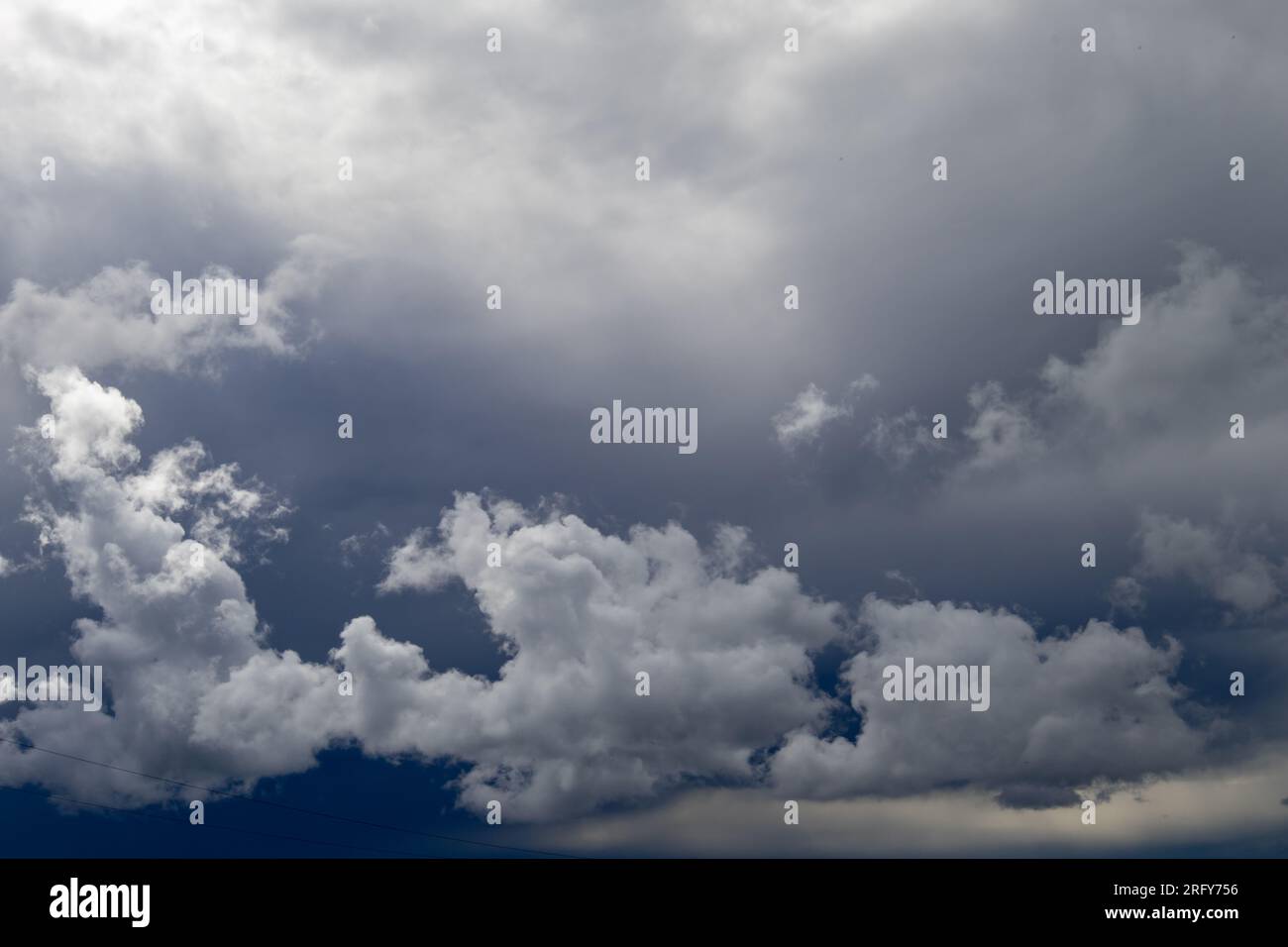 High and low rain clouds Stock Photo - Alamy