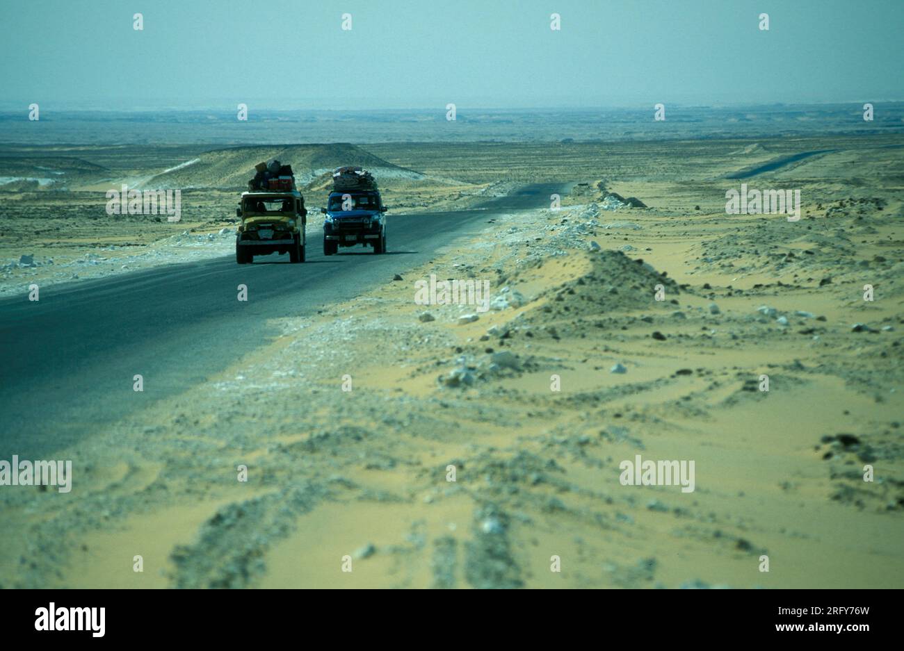 a Tourist Tour with Cars in the Landscape and Nature in the White ...