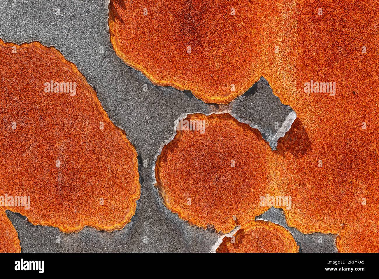 Bright rust on a corroded surface. Rusty peeling spots. Abstract ...