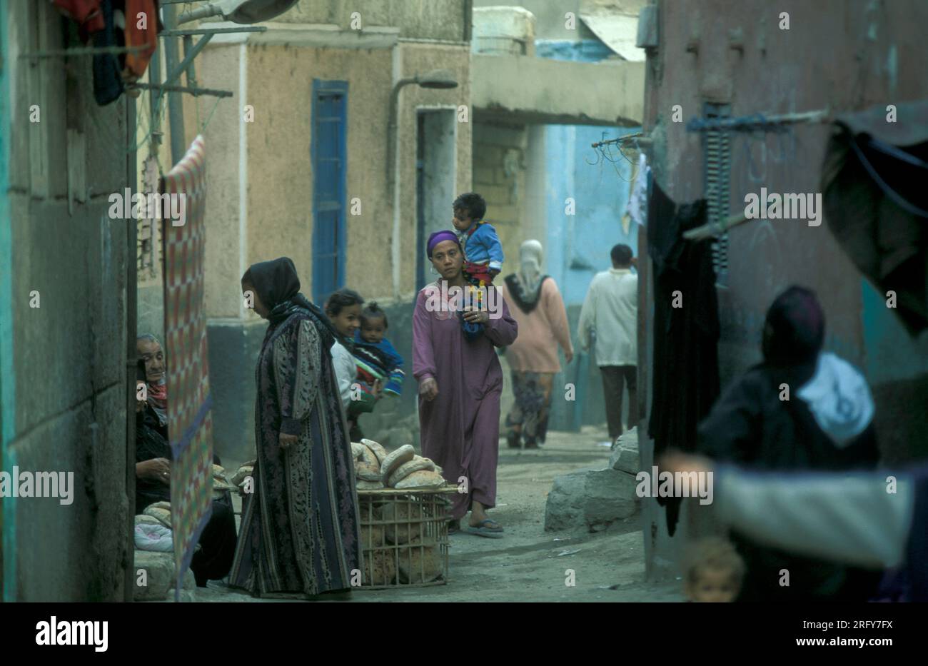 people in alley in the City of Alexandria on the Mediterranean Sea in ...