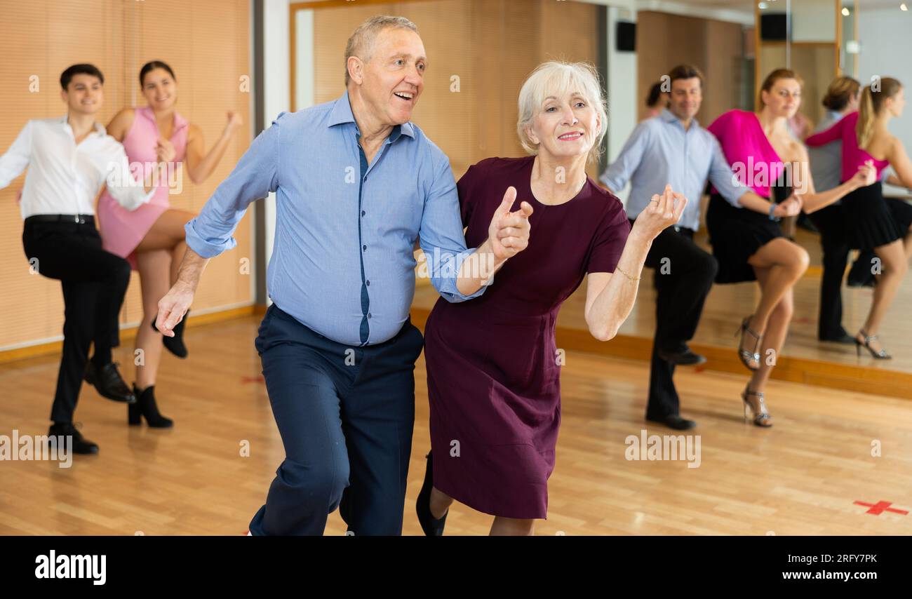 Energetic senior woman dances hi-res stock photography and images - Alamy