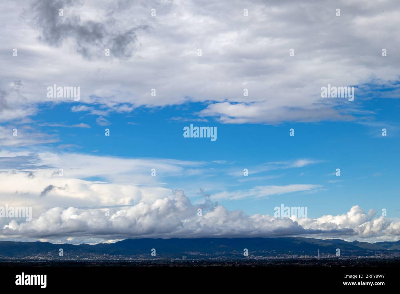 Clouds from a distance hi-res stock photography and images - Alamy