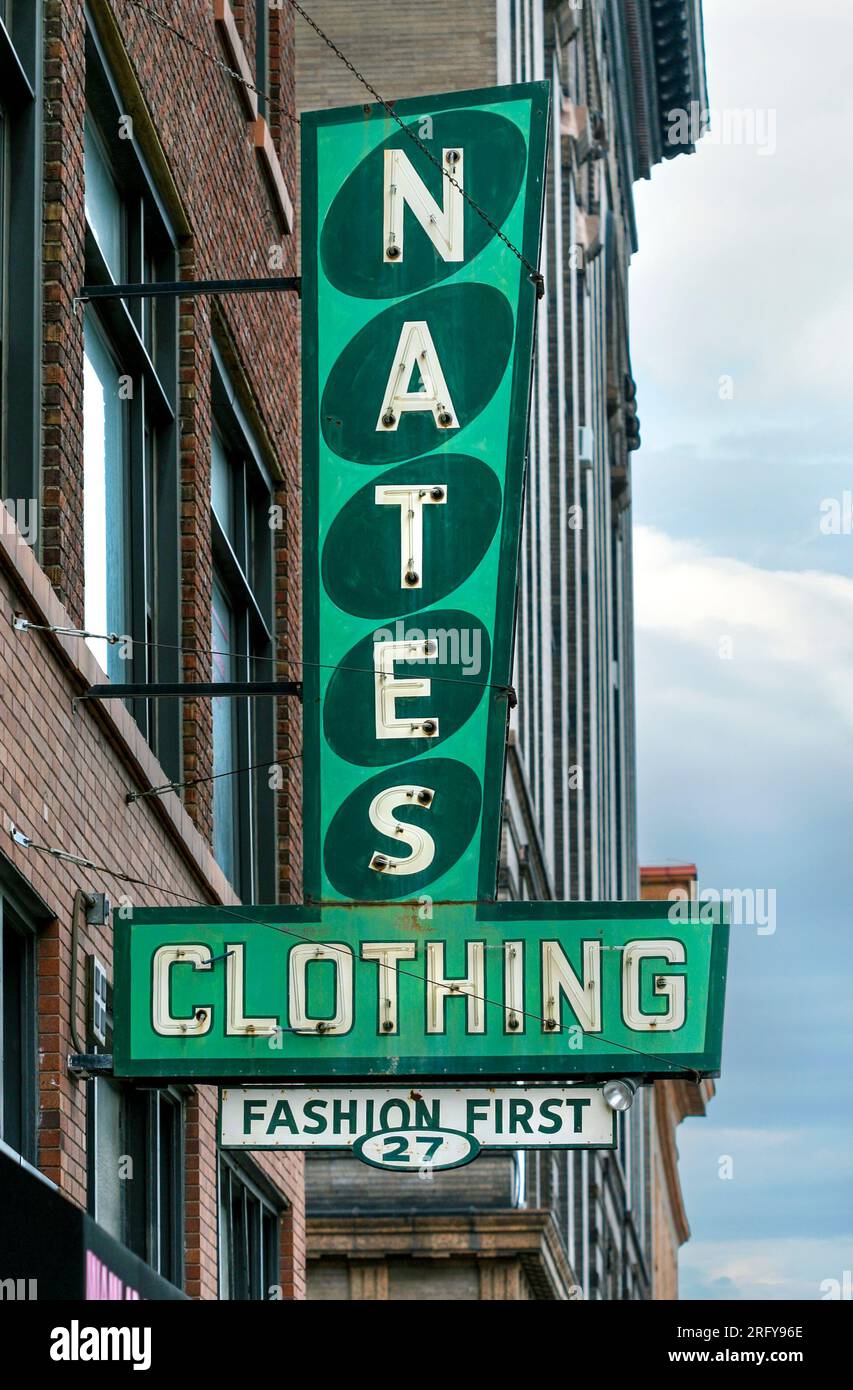 The iconic green and white neon sign for Nate’s Clothing store in ...