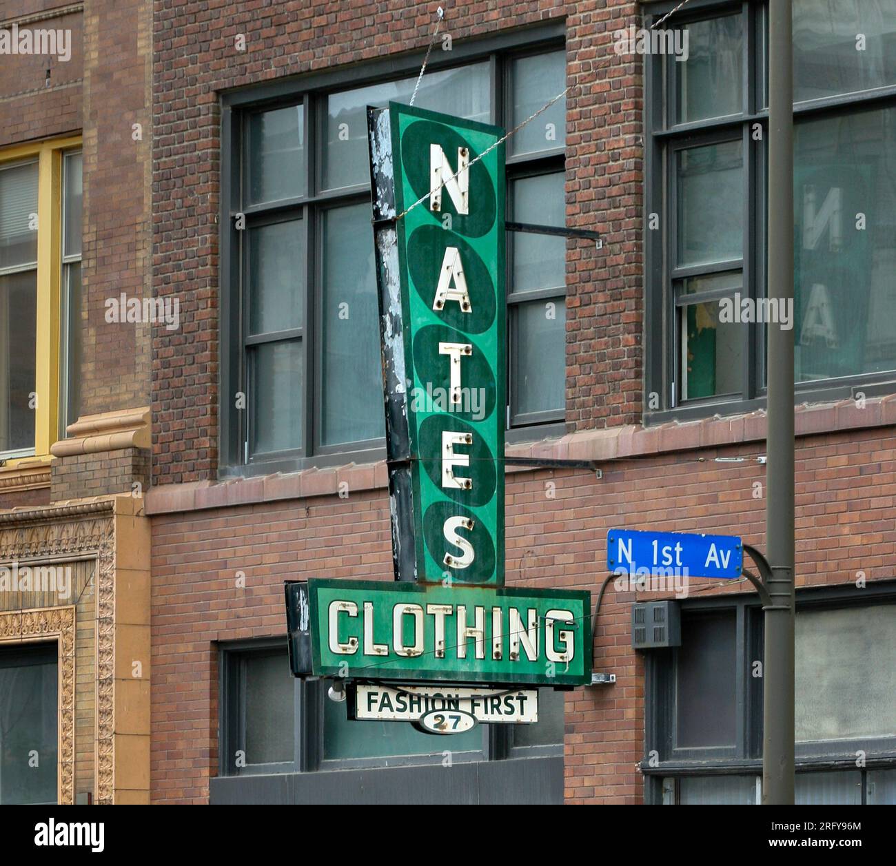 The iconic green and white neon sign for Nate’s Clothing store in ...