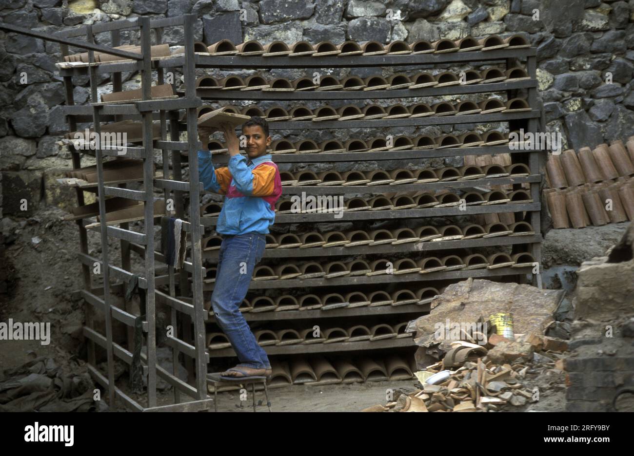 Men workers in a Pottery Factory in the Old Town of Cairo the Capital ...