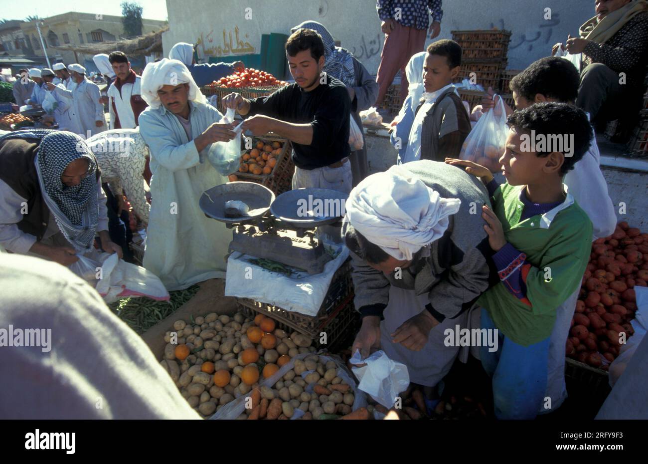 People at the Food Market in the old Village of Siwa in the Libyan or ...