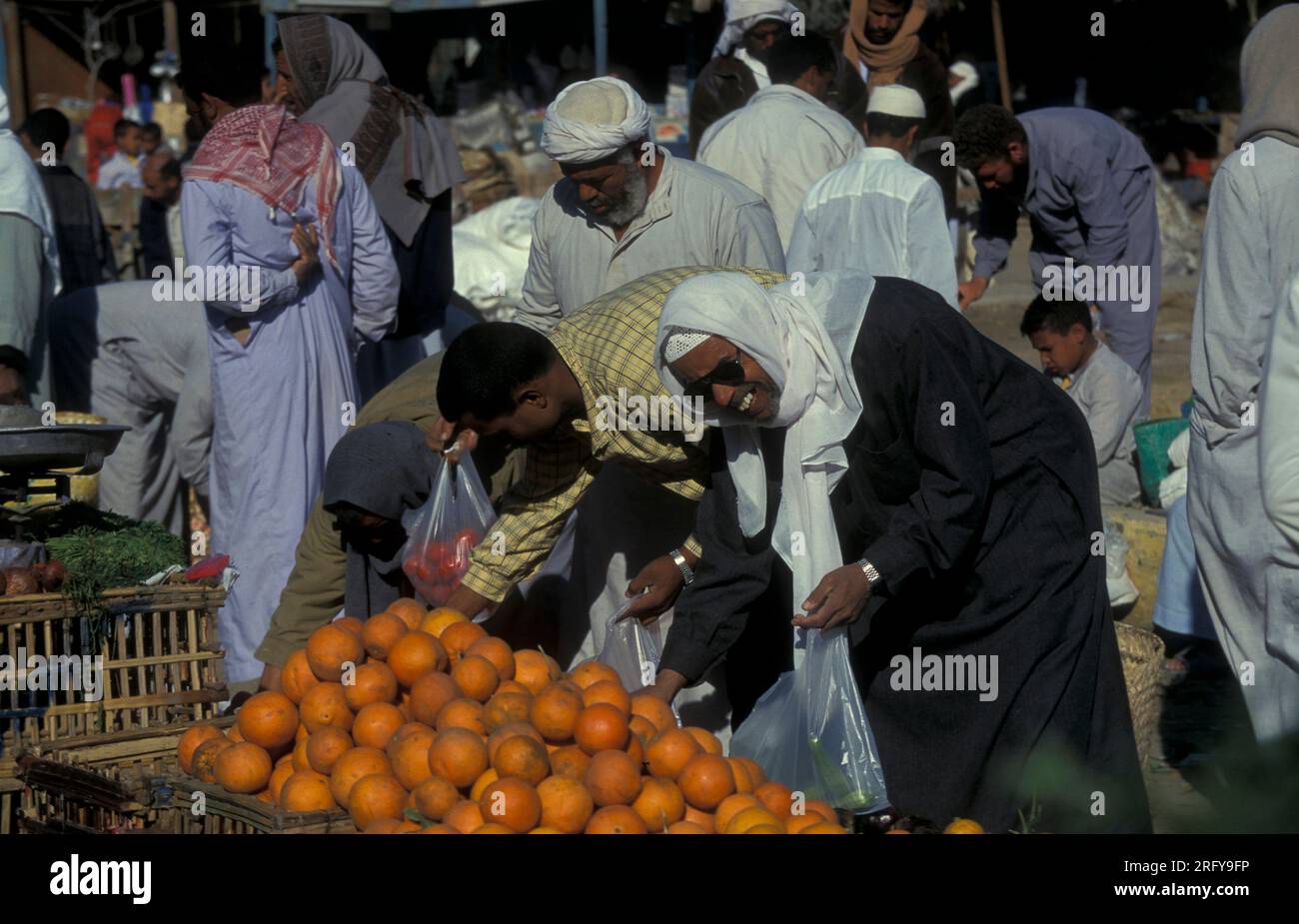People at the Food Market in the old Village of Siwa in the Libyan or ...