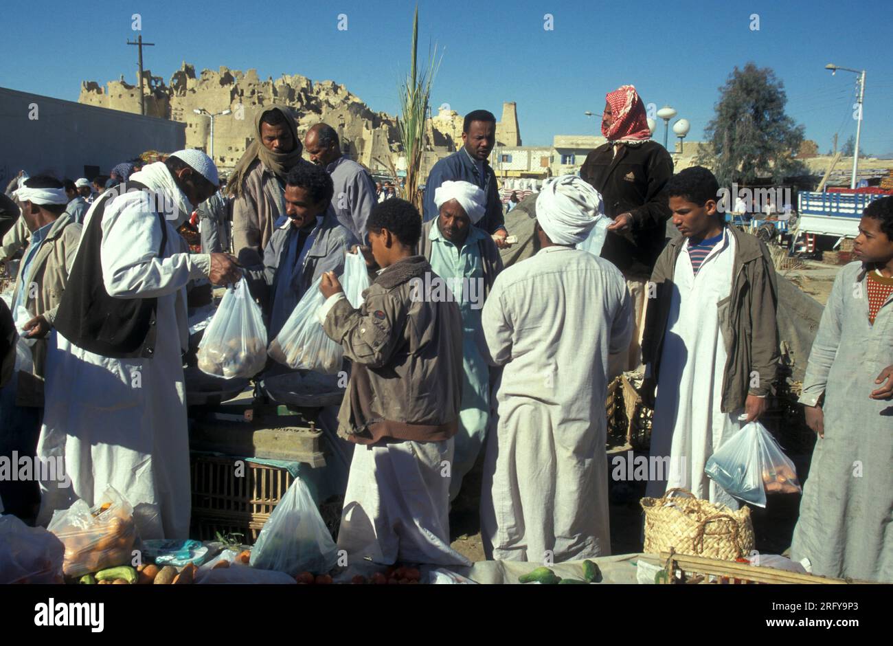 People at the Food Market in the old Village of Siwa in the Libyan or ...