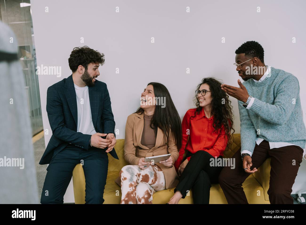 Young business people together on a break. Young Caucasian male person ...