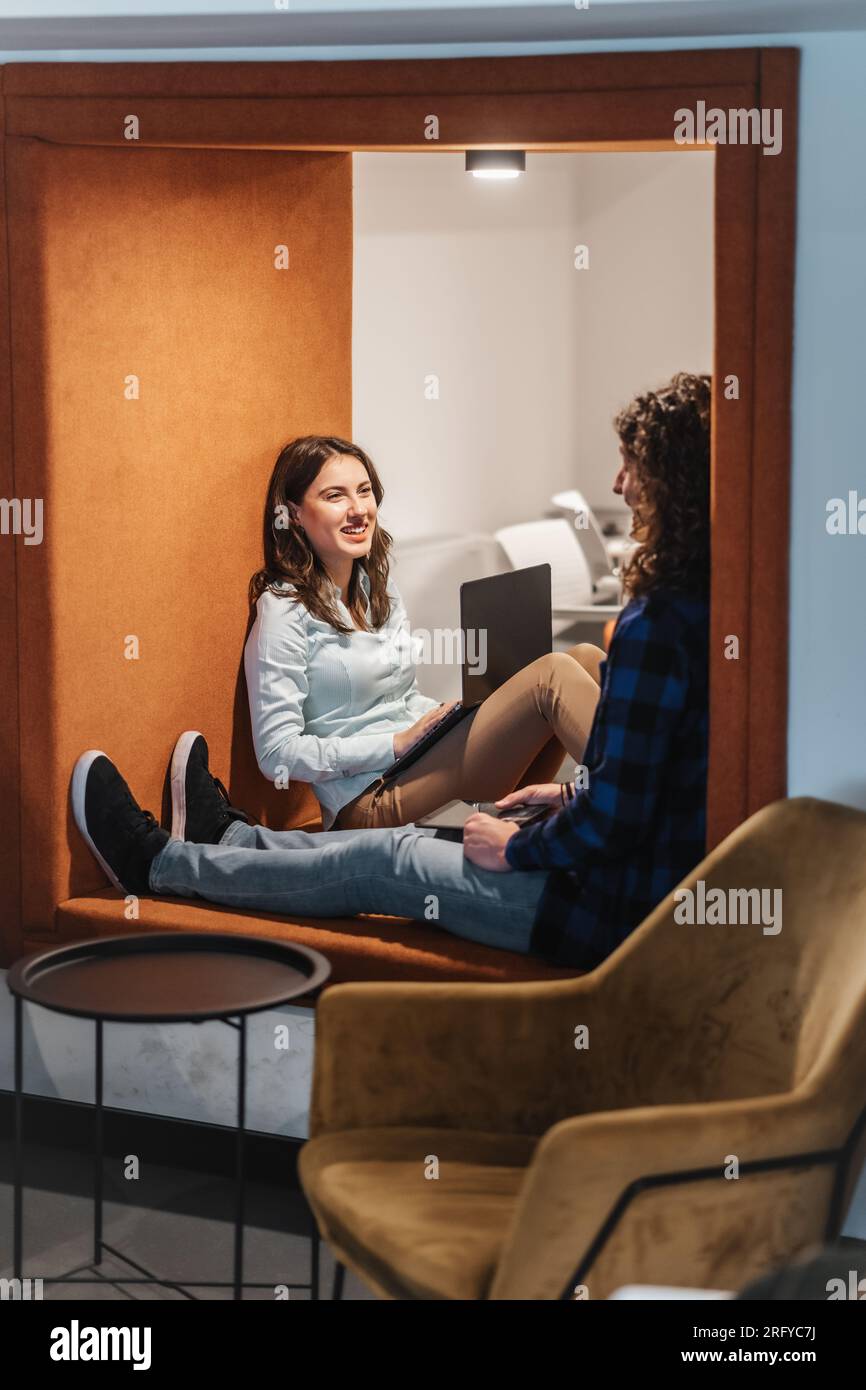 Gorgeous female employee having a conversation with her boyfriend ...