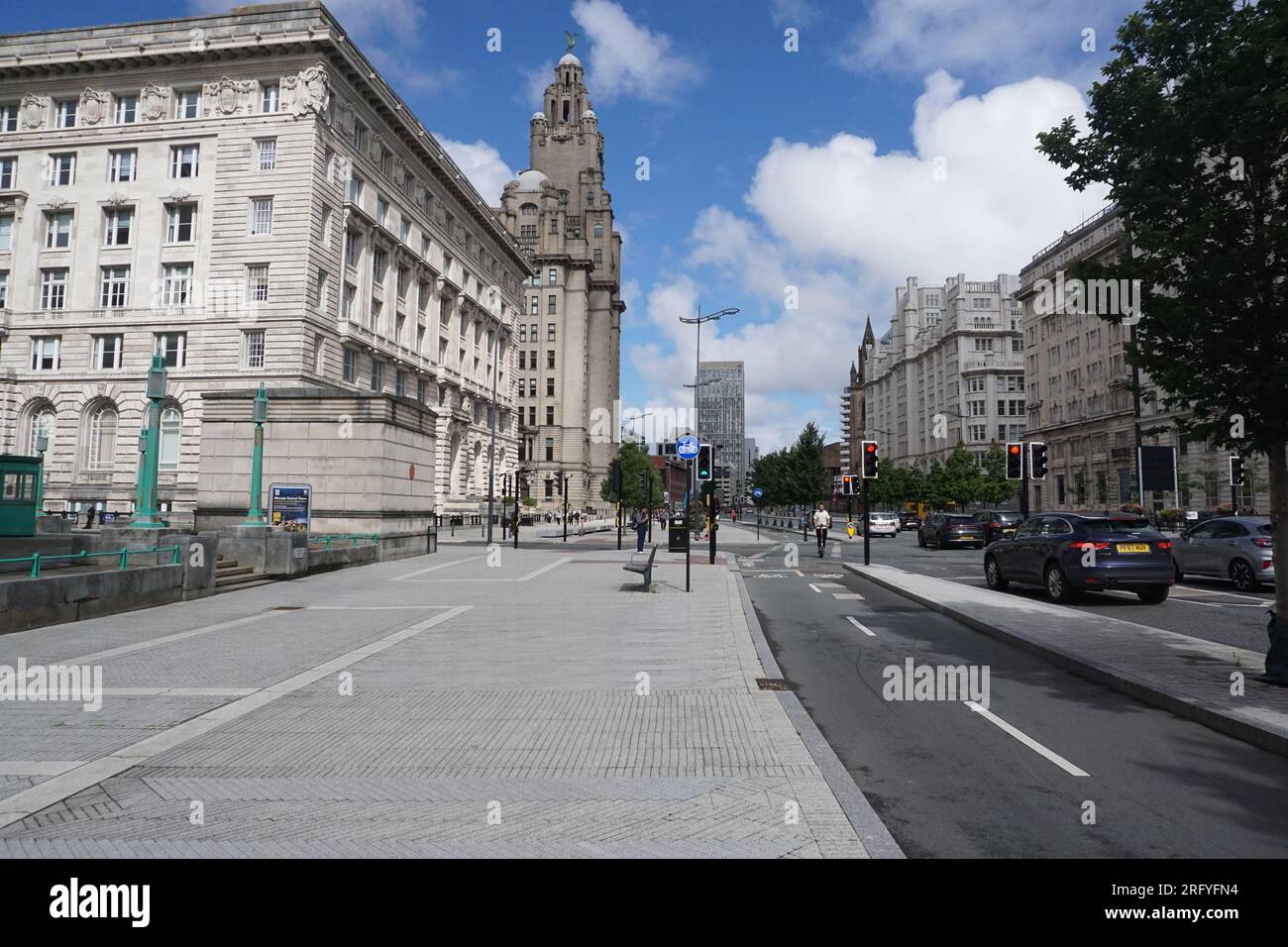 People walking along Strand Street, Liverpool Stock Photo - Alamy