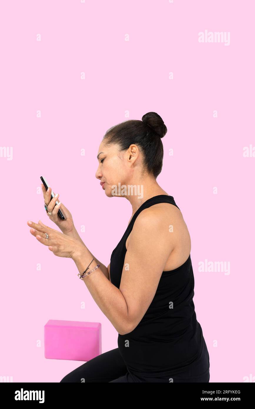 Trauma releasing exercises, senior citizen woman in her sixties ...