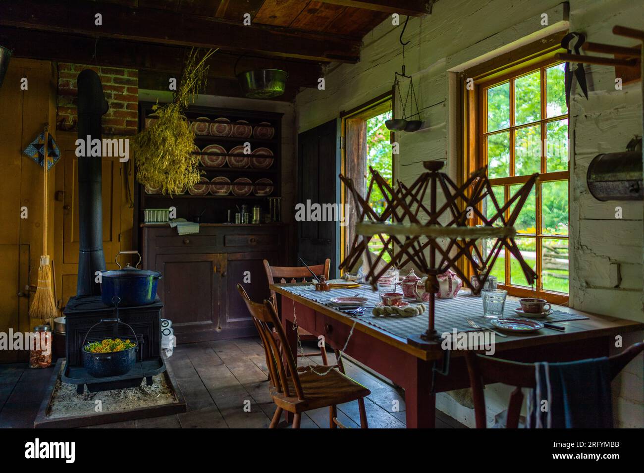 The village dressmaker is located in a small stone house at the corner ...