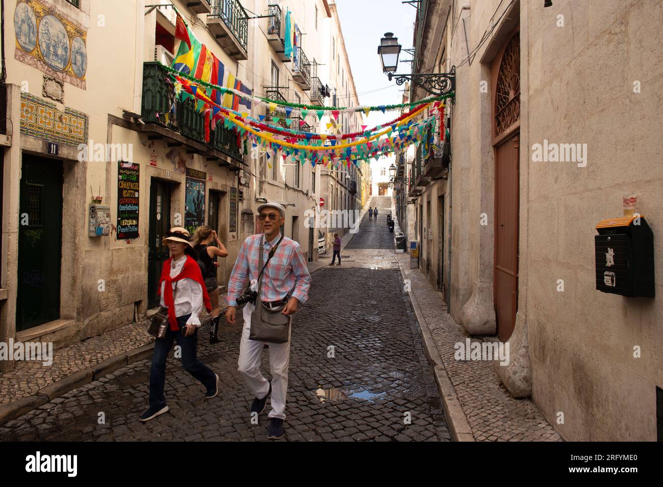 Strolling the charming streets of Lisbon, where every corner unveils ...
