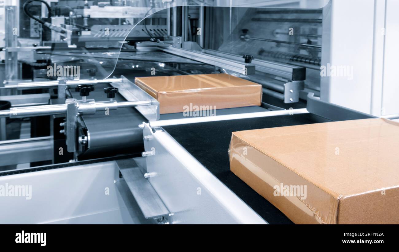 Automatic industrial machine for plastic packaging with light effect of ...