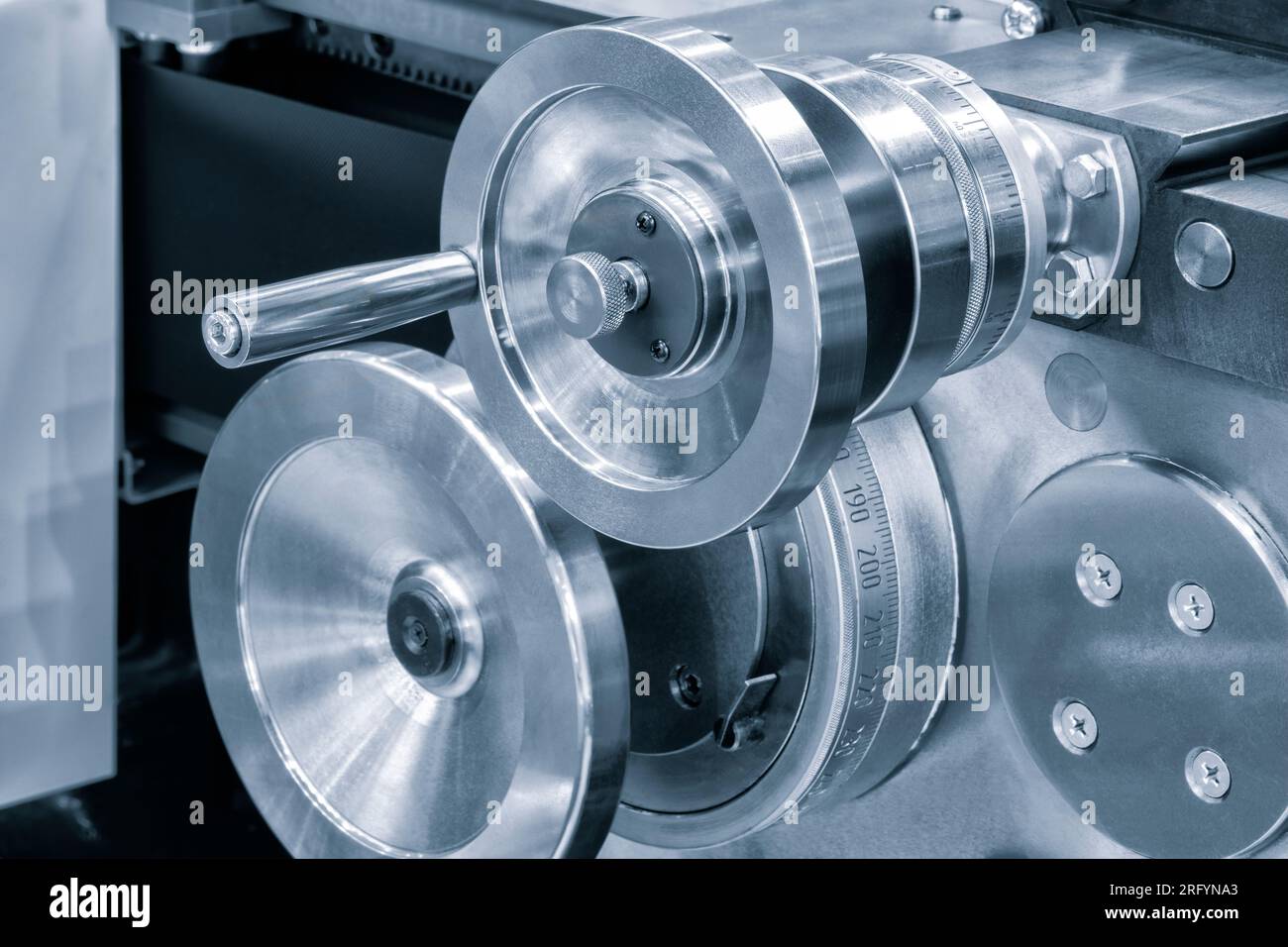 Lathe control knobs close up blue tone. Metal machine tools industry ...