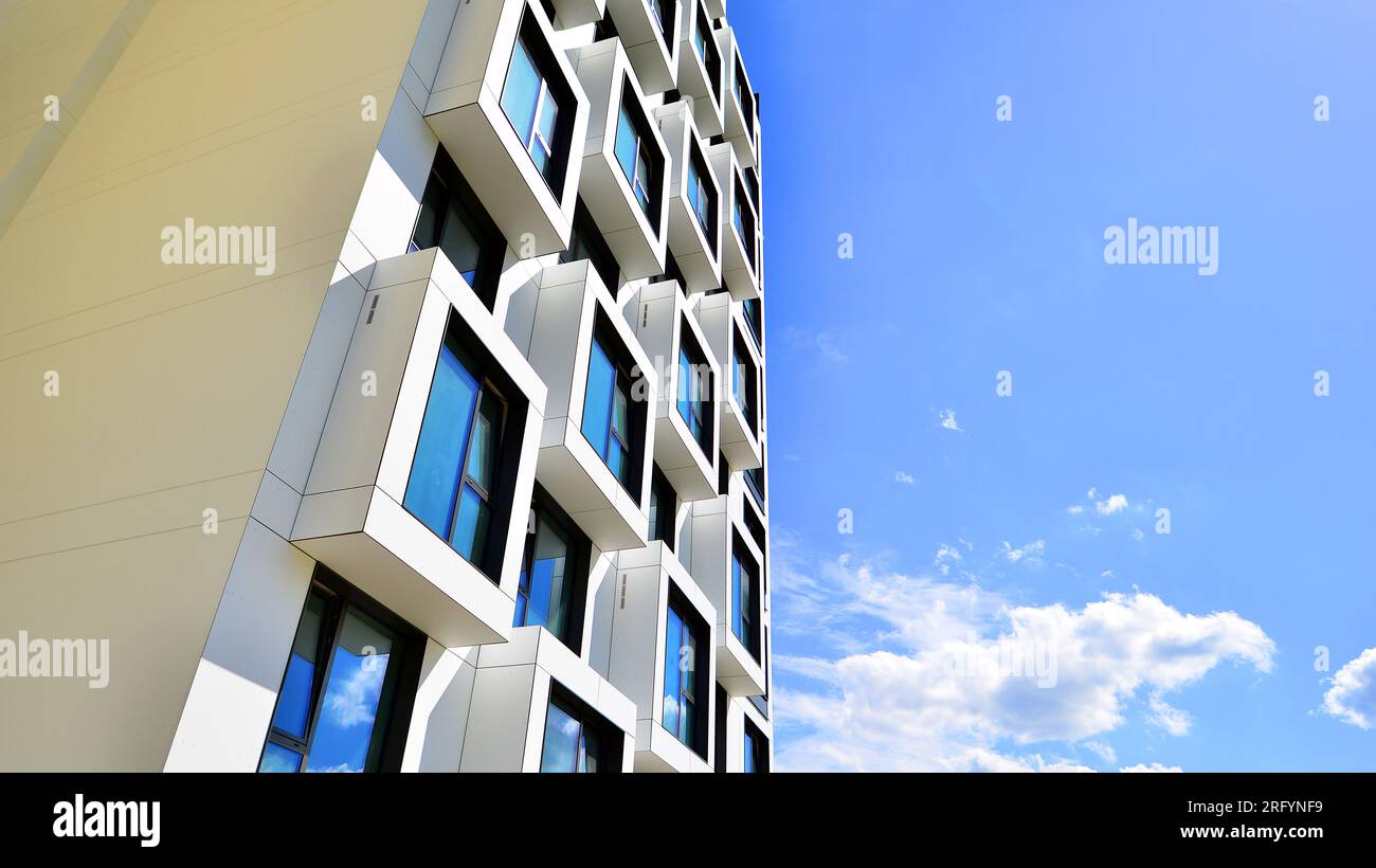 The facade of the new apartment building shaped like cubes. Minimalist ...
