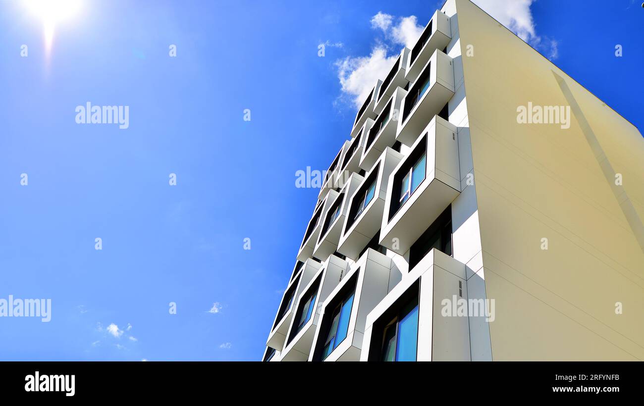 The facade of the new apartment building shaped like cubes. Minimalist ...