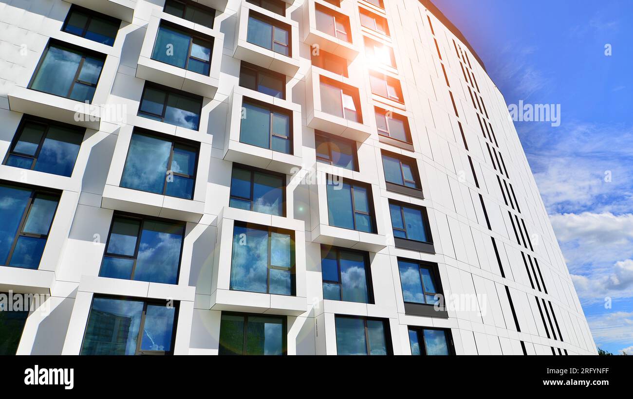 The facade of the new apartment building shaped like cubes. Minimalist ...