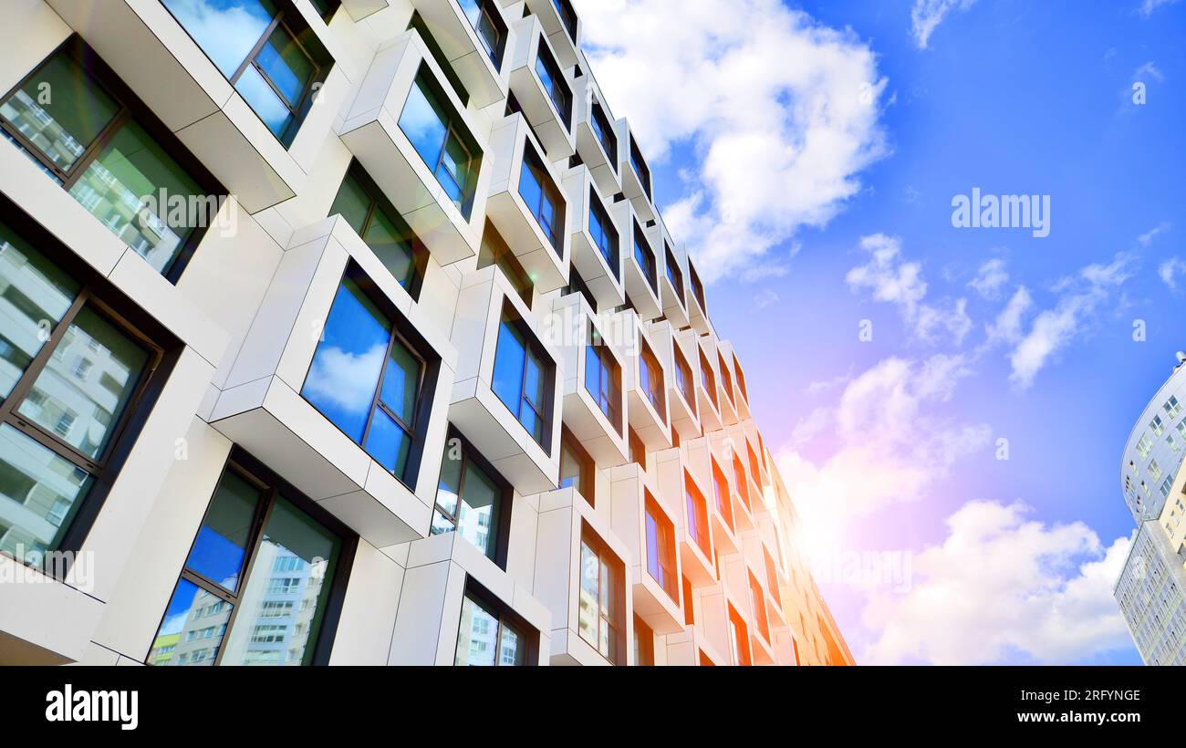 The facade of the new apartment building shaped like cubes. Minimalist ...