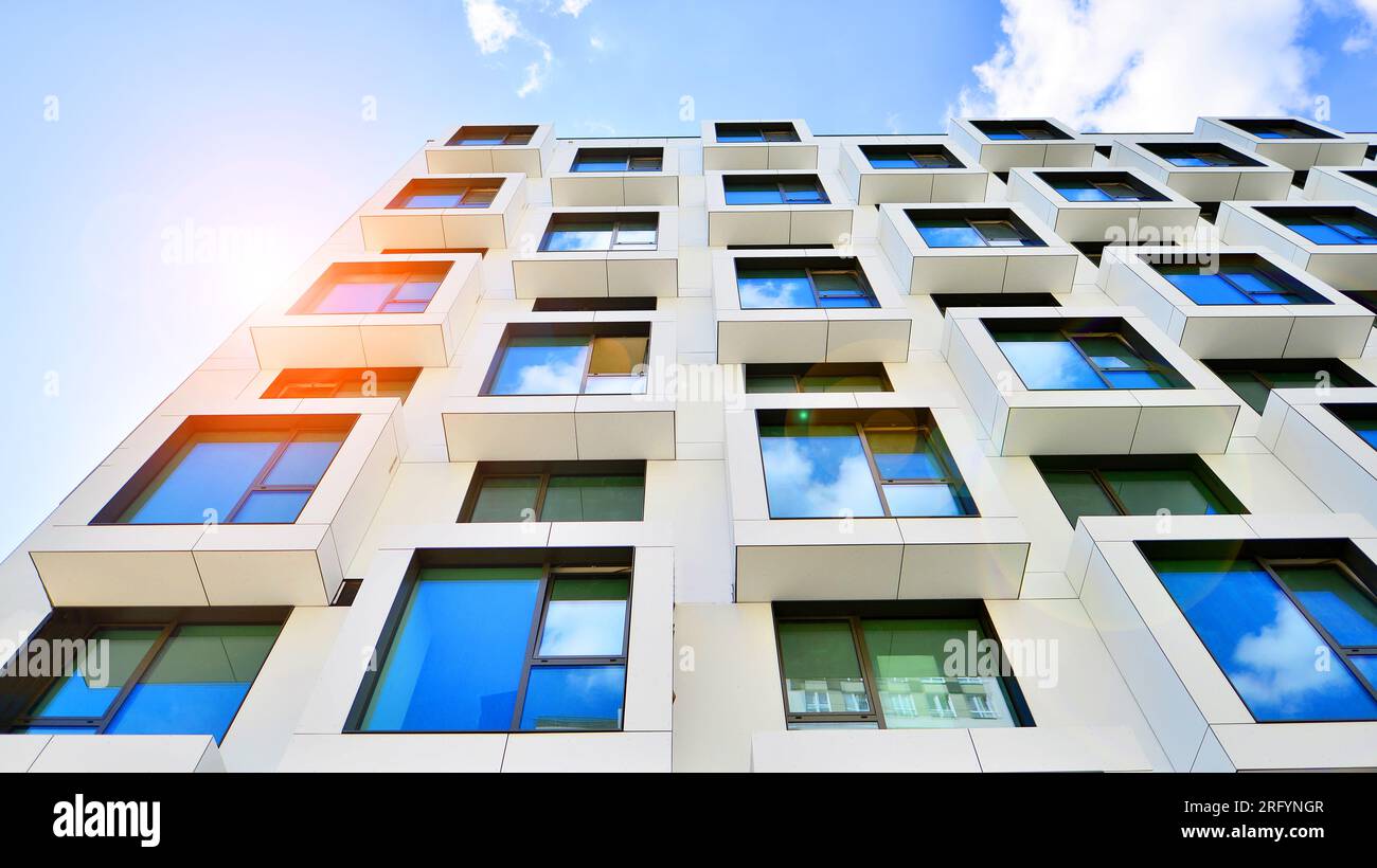The facade of the new apartment building shaped like cubes. Minimalist ...