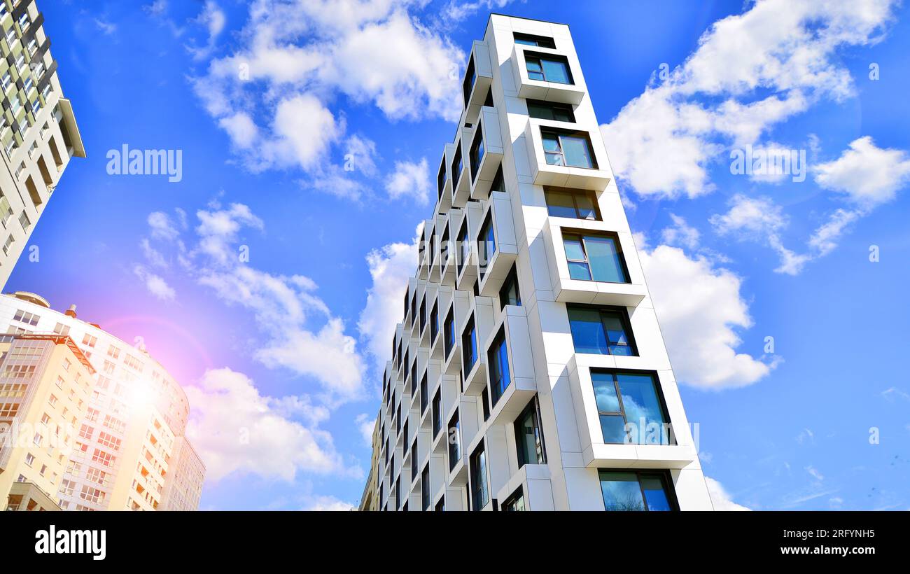 The facade of the new apartment building shaped like cubes. Minimalist ...