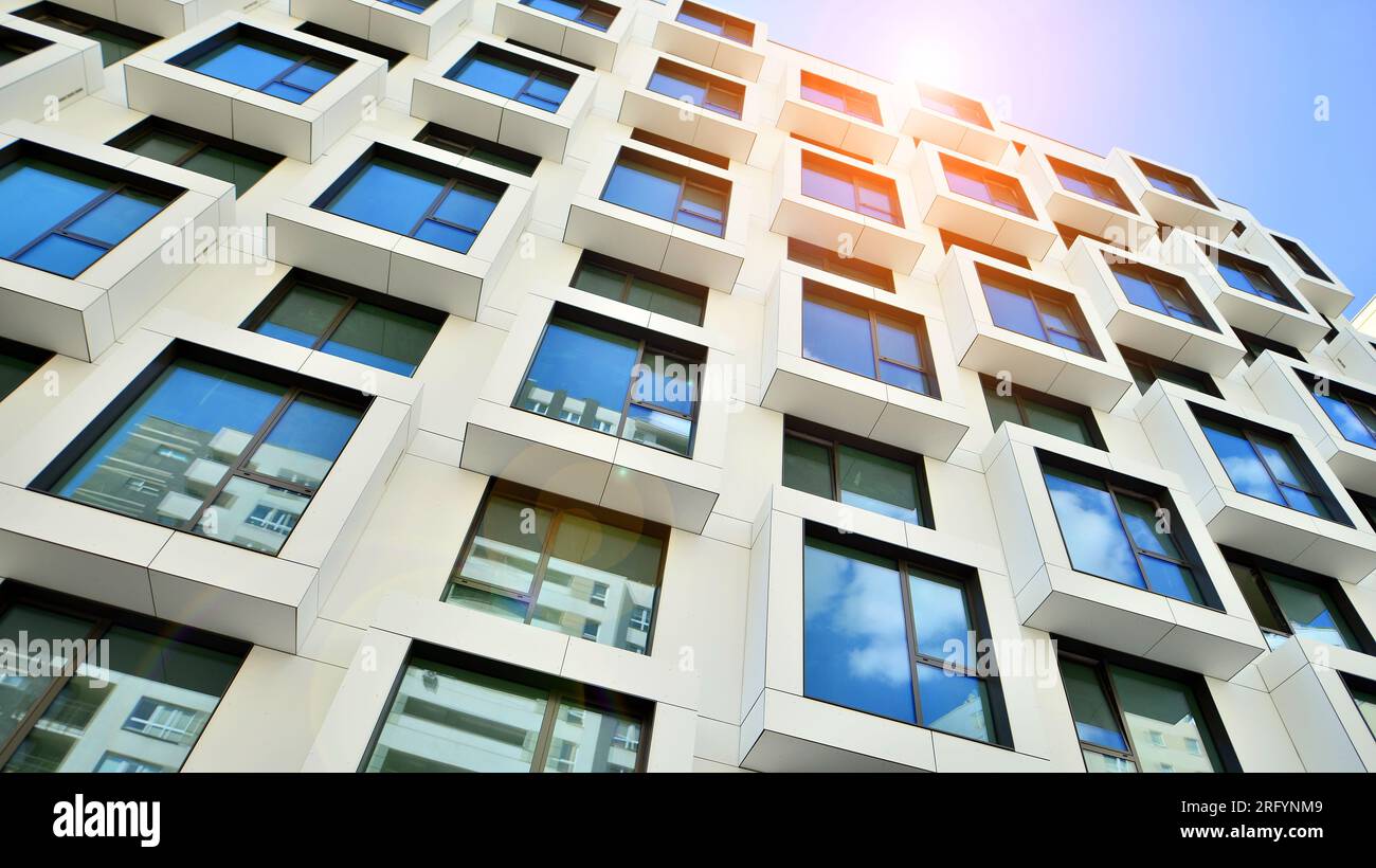 The facade of the new apartment building shaped like cubes. Minimalist ...