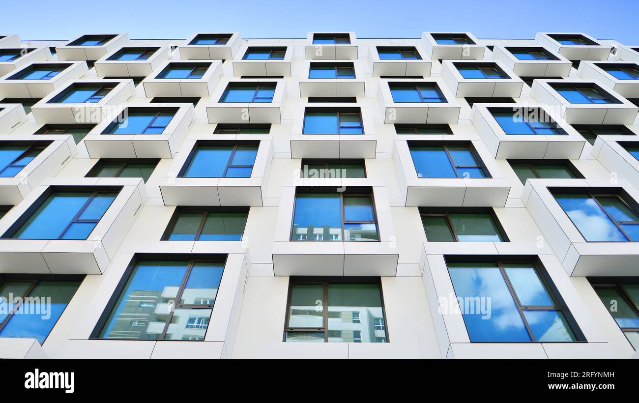 The facade of the new apartment building shaped like cubes. Minimalist ...