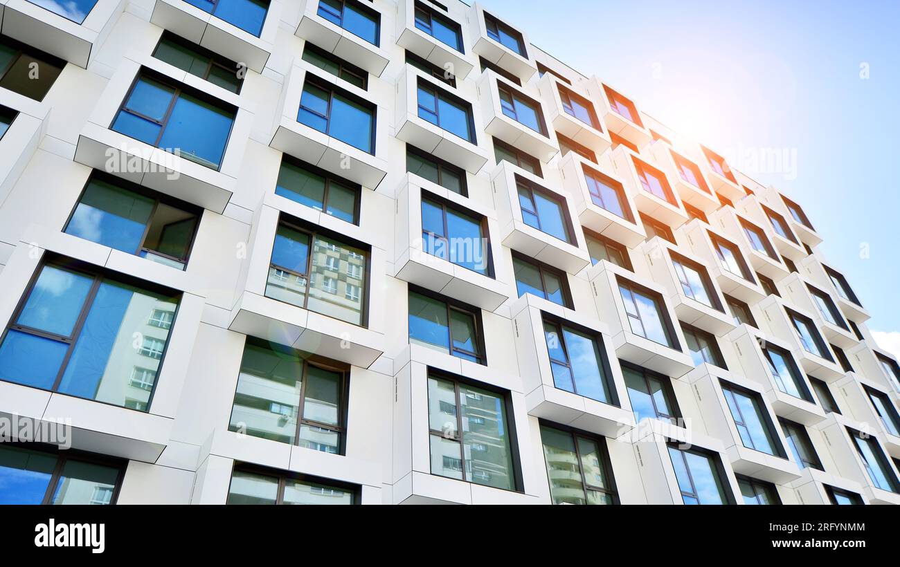 The facade of the new apartment building shaped like cubes. Minimalist ...