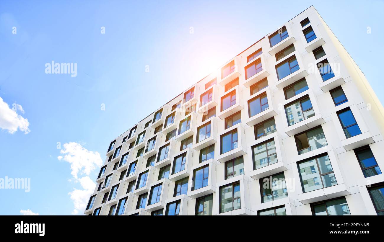The facade of the new apartment building shaped like cubes. Minimalist ...
