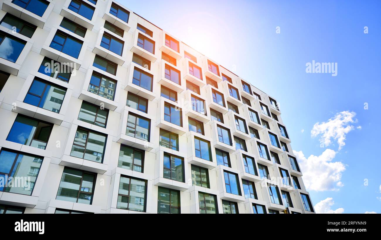 The facade of the new apartment building shaped like cubes. Minimalist ...