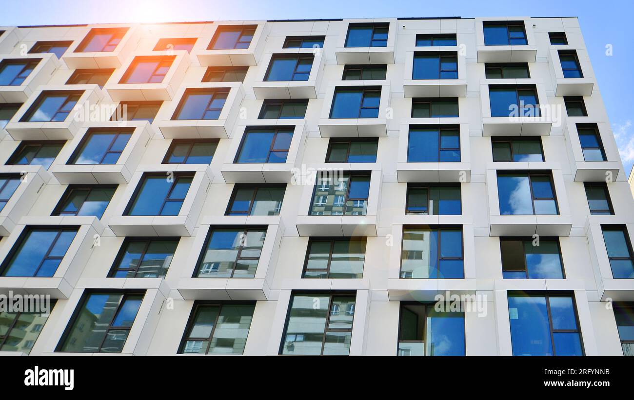 The facade of the new apartment building shaped like cubes. Minimalist ...