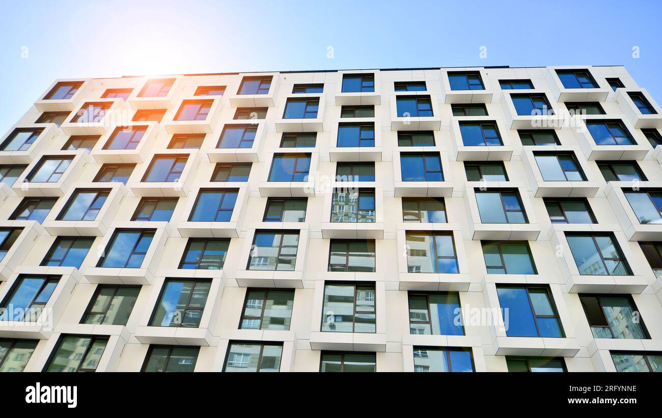 The facade of the new apartment building shaped like cubes. Minimalist ...