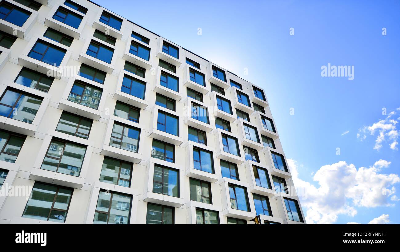 The facade of the new apartment building shaped like cubes. Minimalist ...