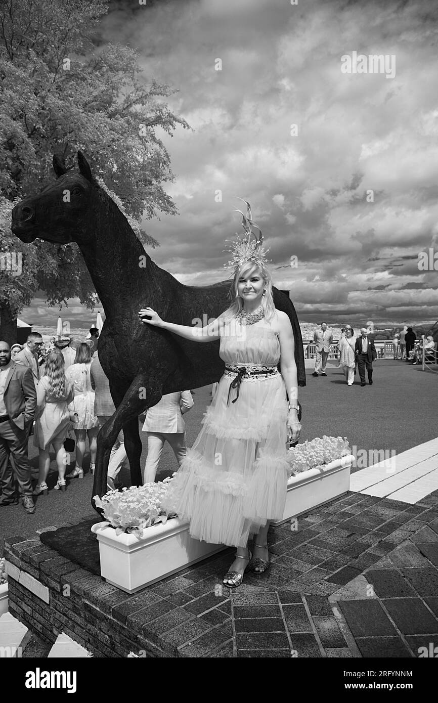 Racegoer August Nazareth at the Qatar Goodwood Festival, "Glorious ...