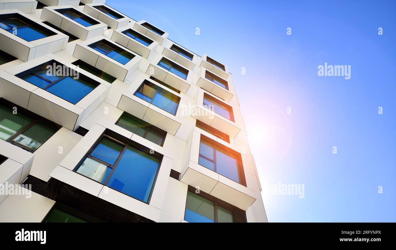 The facade of the new apartment building shaped like cubes. Minimalist ...