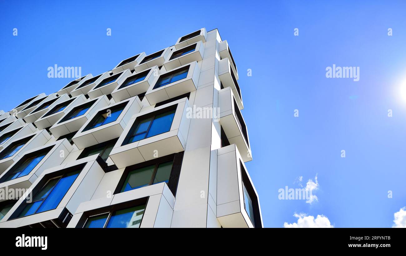 The facade of the new apartment building shaped like cubes. Minimalist ...