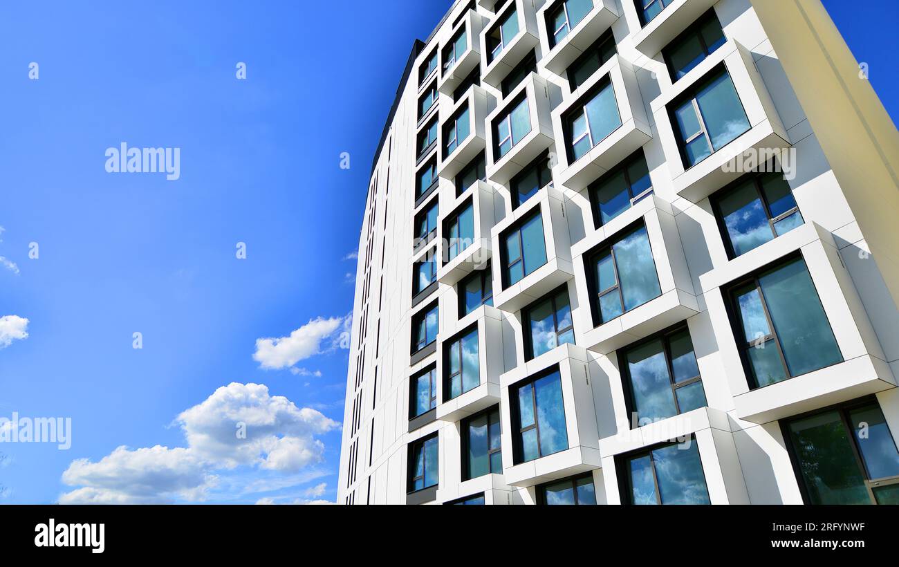 The facade of the new apartment building shaped like cubes. Minimalist ...