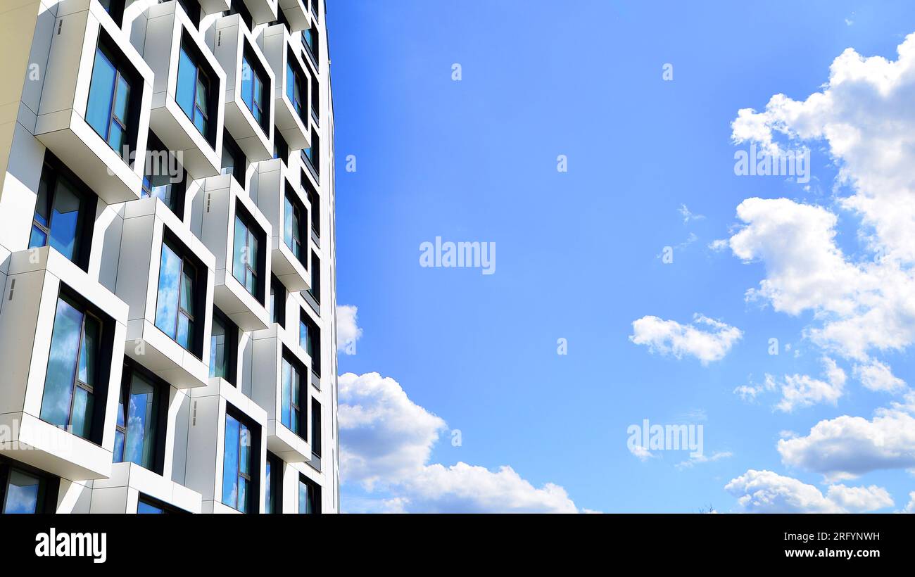 The facade of the new apartment building shaped like cubes. Minimalist ...