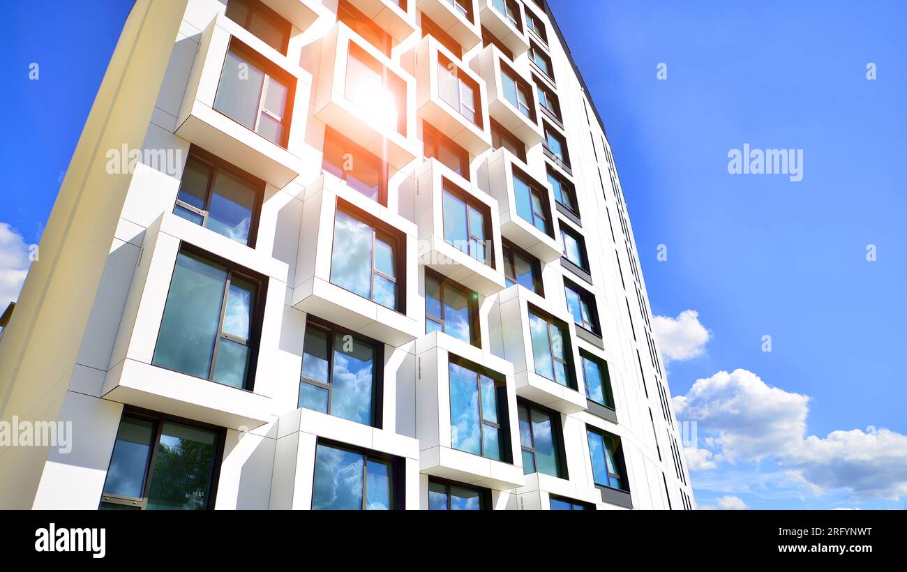 The facade of the new apartment building shaped like cubes. Minimalist ...