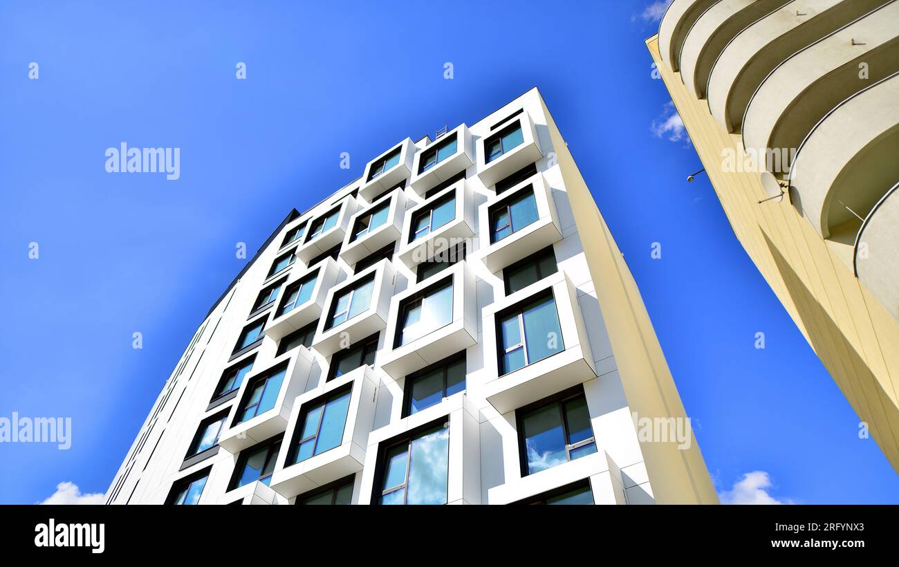 The facade of the new apartment building shaped like cubes. Minimalist ...