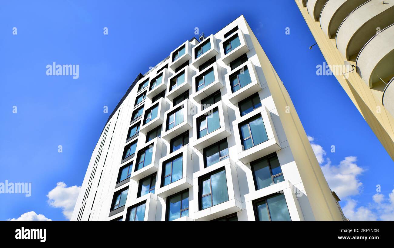 The facade of the new apartment building shaped like cubes. Minimalist ...