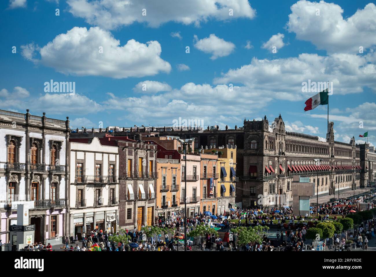 A panoramic view captures a bustling street near the Zócalo in Mexico ...
