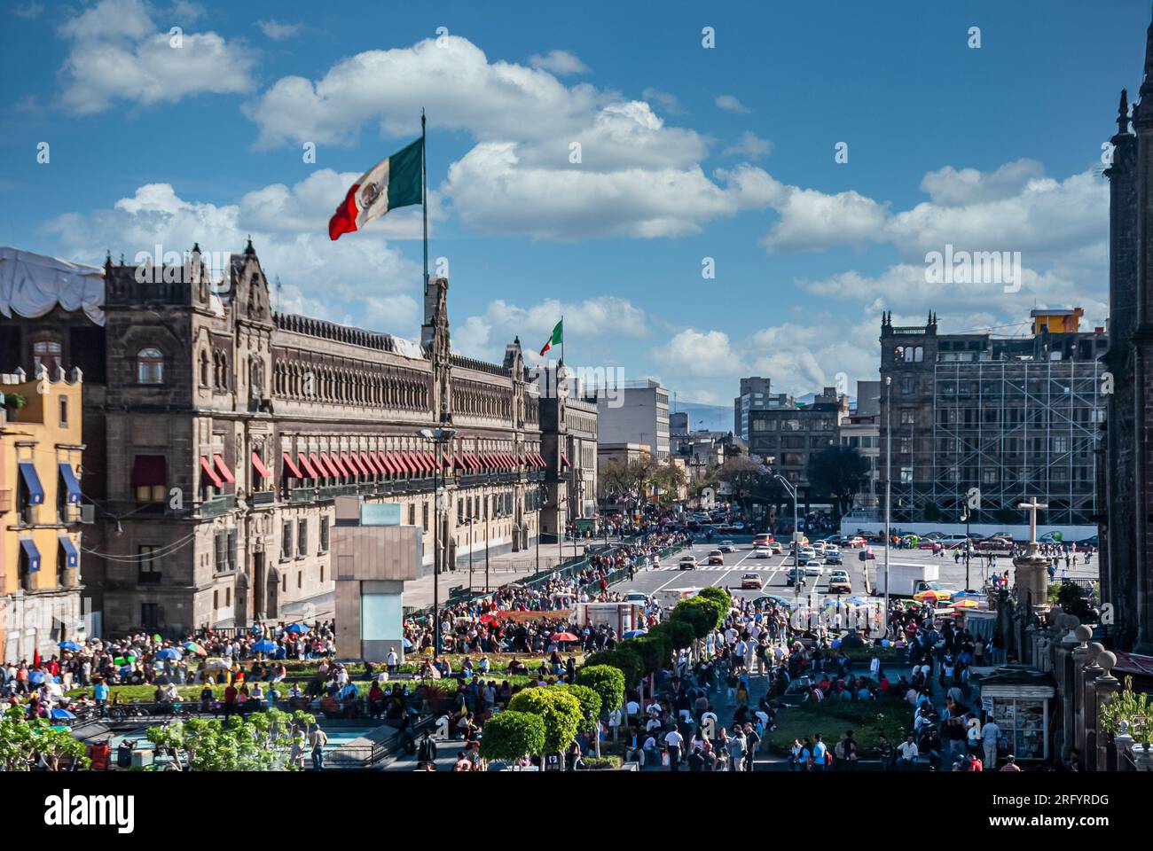 A panoramic view captures a bustling street near the Zócalo in Mexico ...
