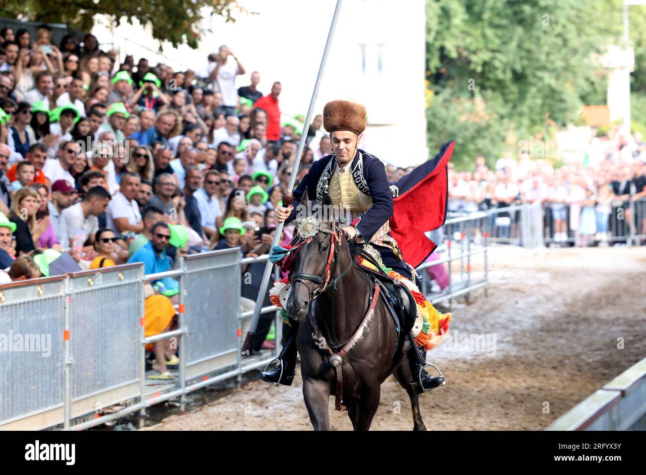 Sinj, Croatia. 06th Aug, 2023. Men wearing traditional knight costumes ...