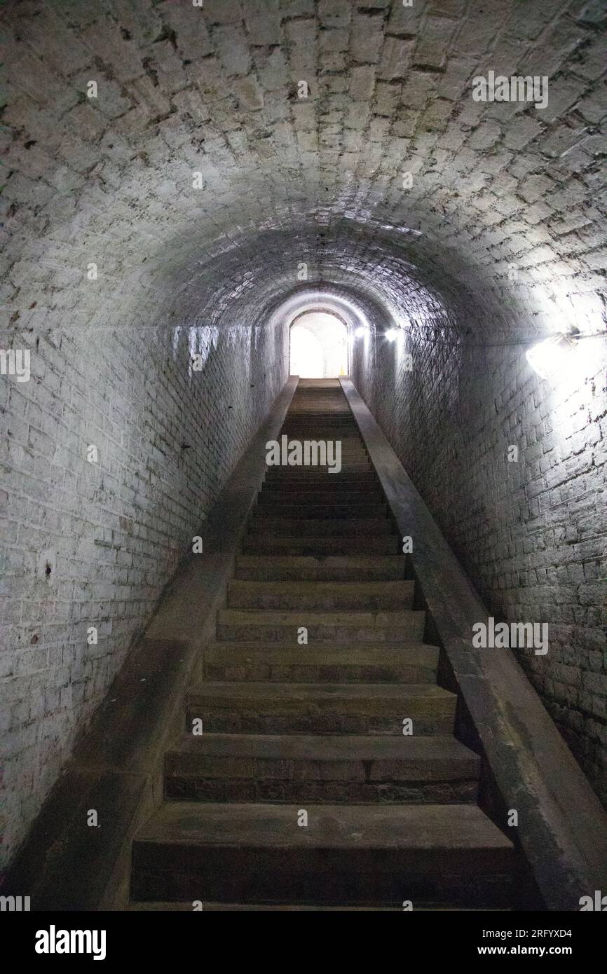 Stone stairs inside a tunnel at Drop Redoubt fort, Dover, England Stock ...