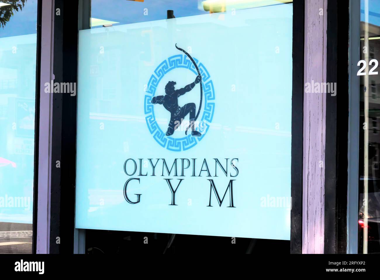 Window sign for Olympians Gym - depicting a kneeling archer with bow ...