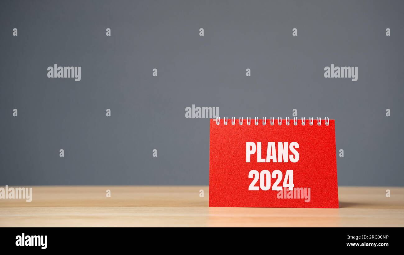 Notes with words Plans 2024. Planning goals and tasks. New business ...