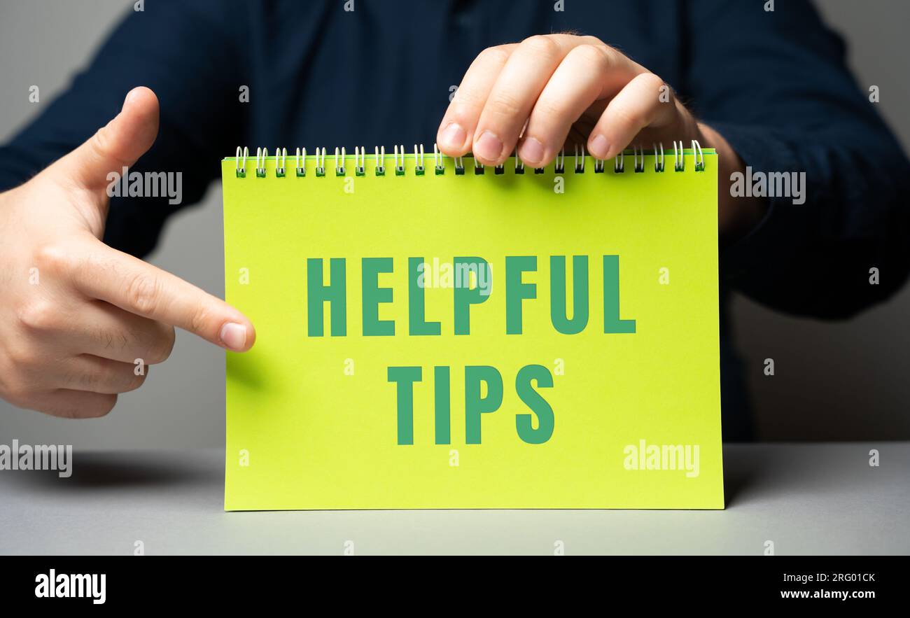 Helpful tips on notes in male hands. Business concept. Strategy, plan ...