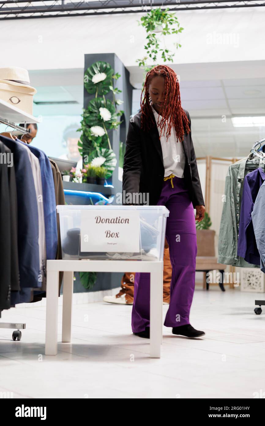 Person in charity shop donating hi-res stock photography and images - Alamy